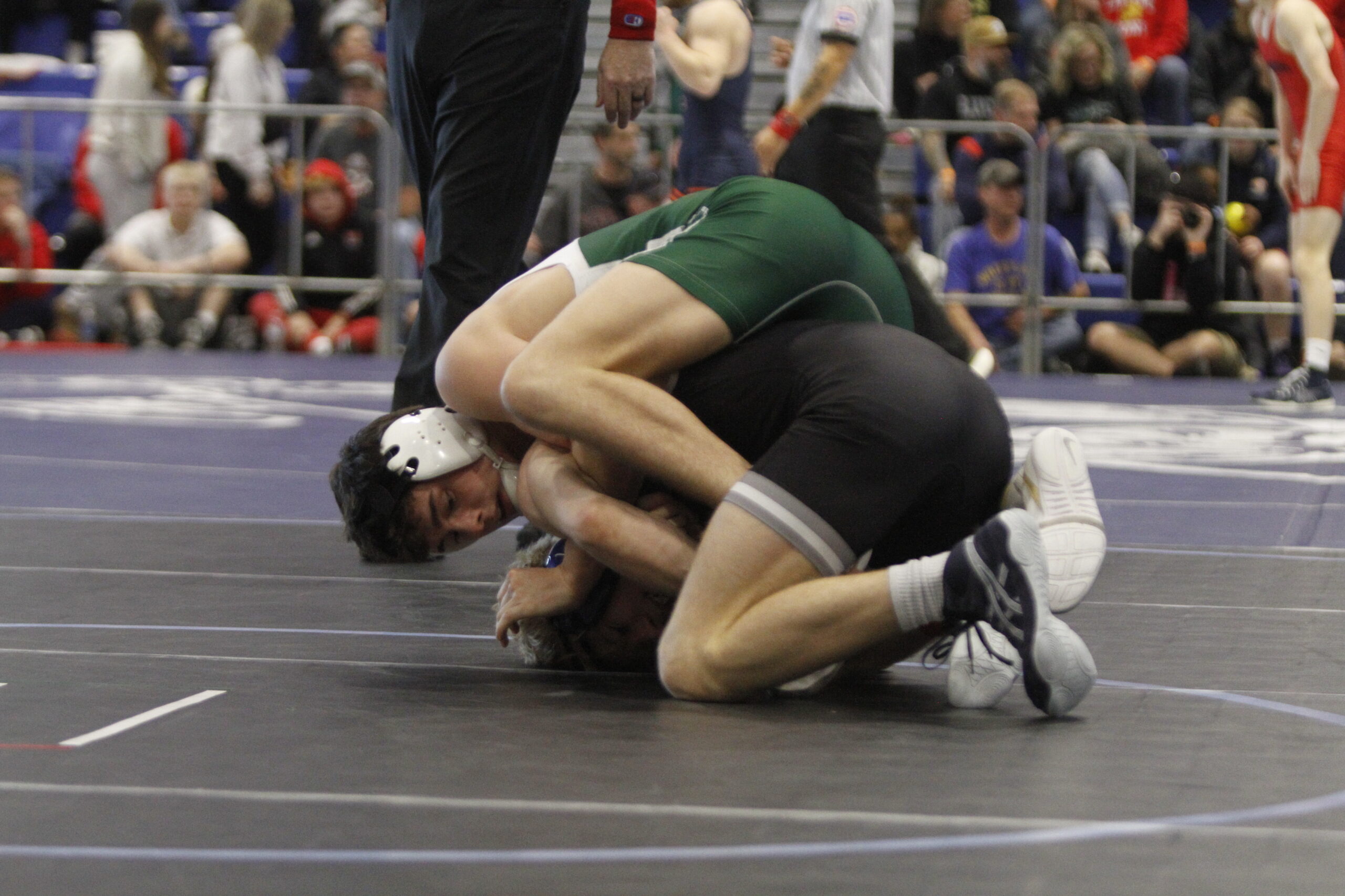 Free State sends 9 wrestlers to second day of 6A state boys wrestling ...